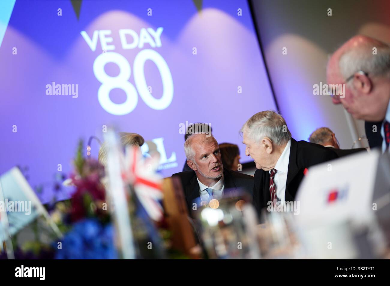 Minister for Veterans Alistair Carns talks to veterans at a tea party ...