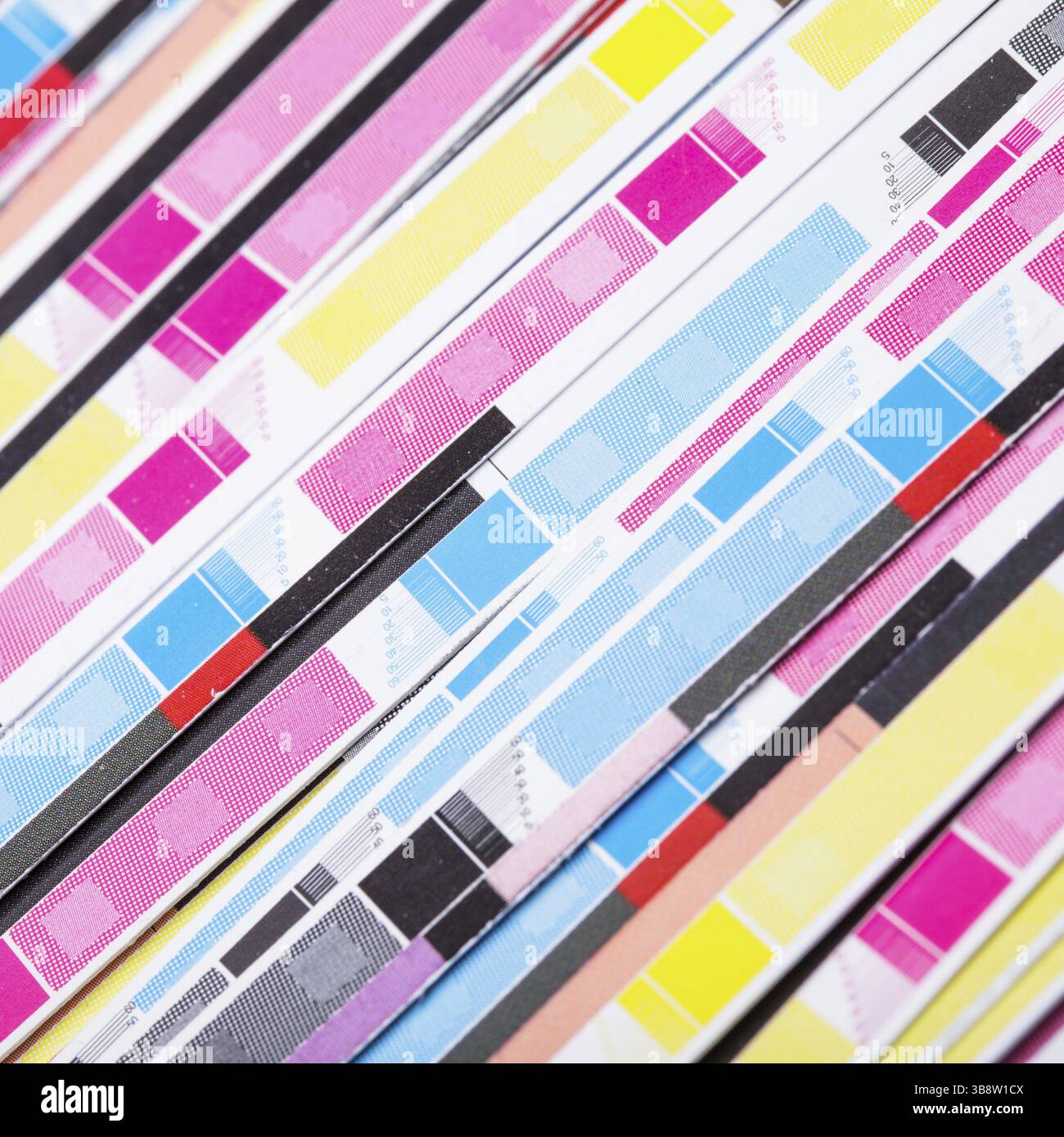 CMYK color on printed sheets of paper after cutting Stock Photo - Alamy