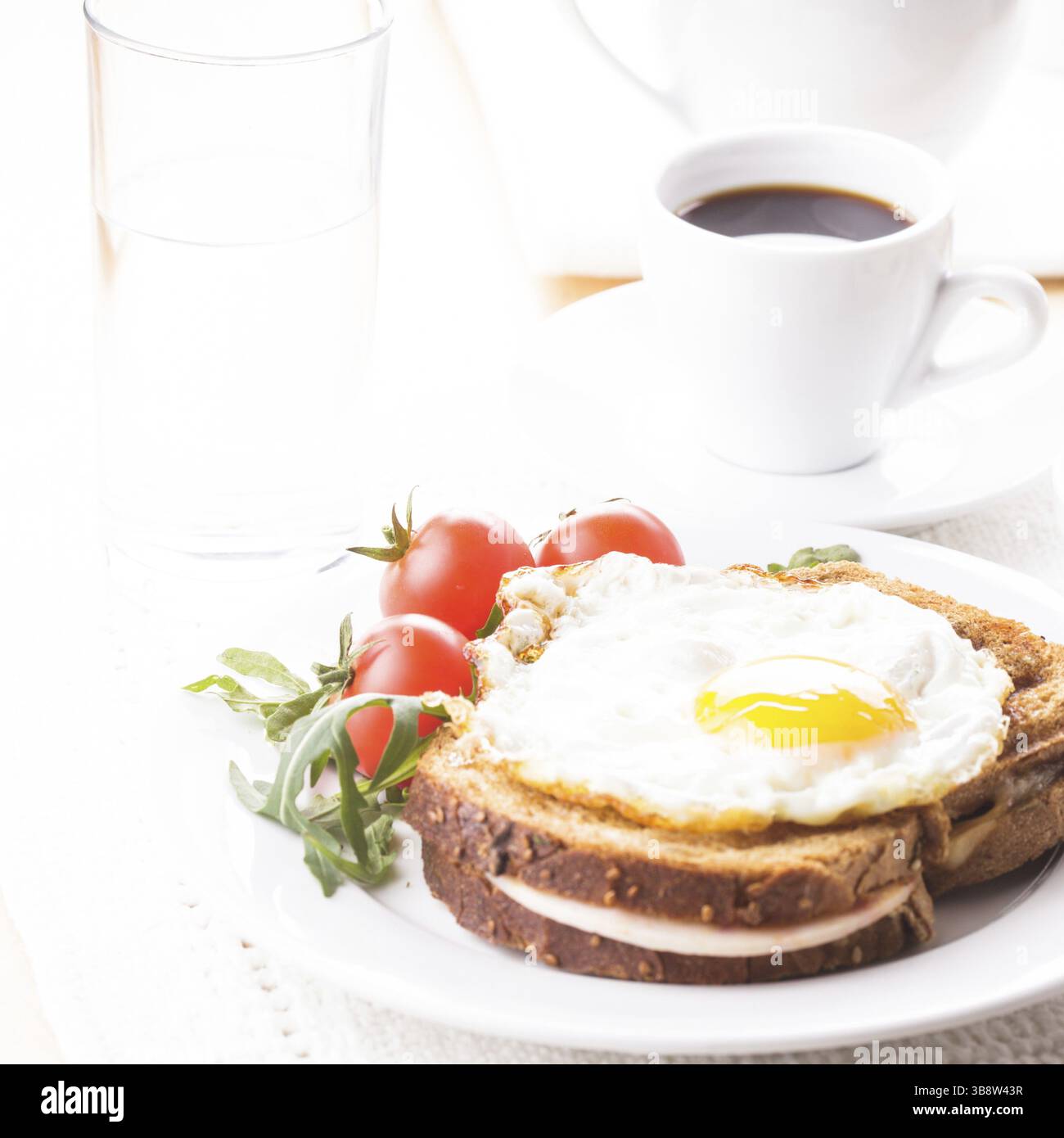 Breakfast with coffee, Croque Madame sandwich close up Stock Photo - Alamy
