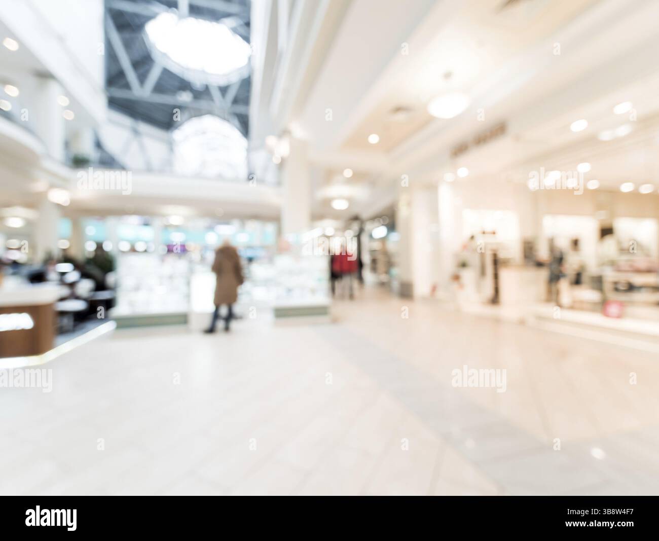 Shopping mall blur background with bokeh. Blurred hall of shopping mall ...
