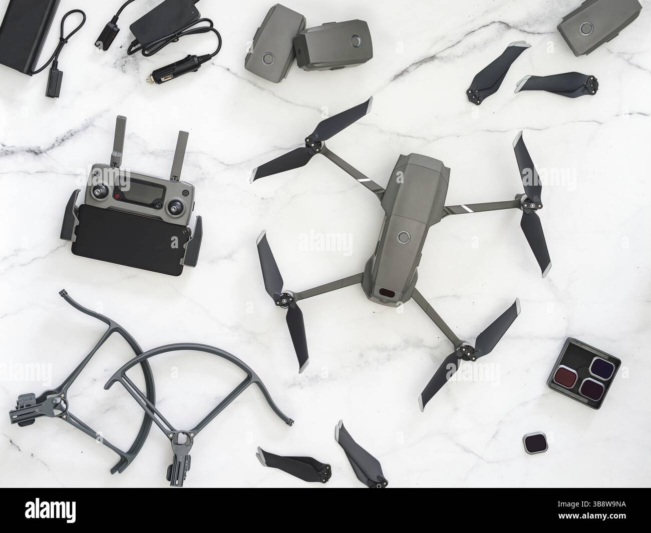 Set of folding drone or quadcopter with many accessories, top view or ...
