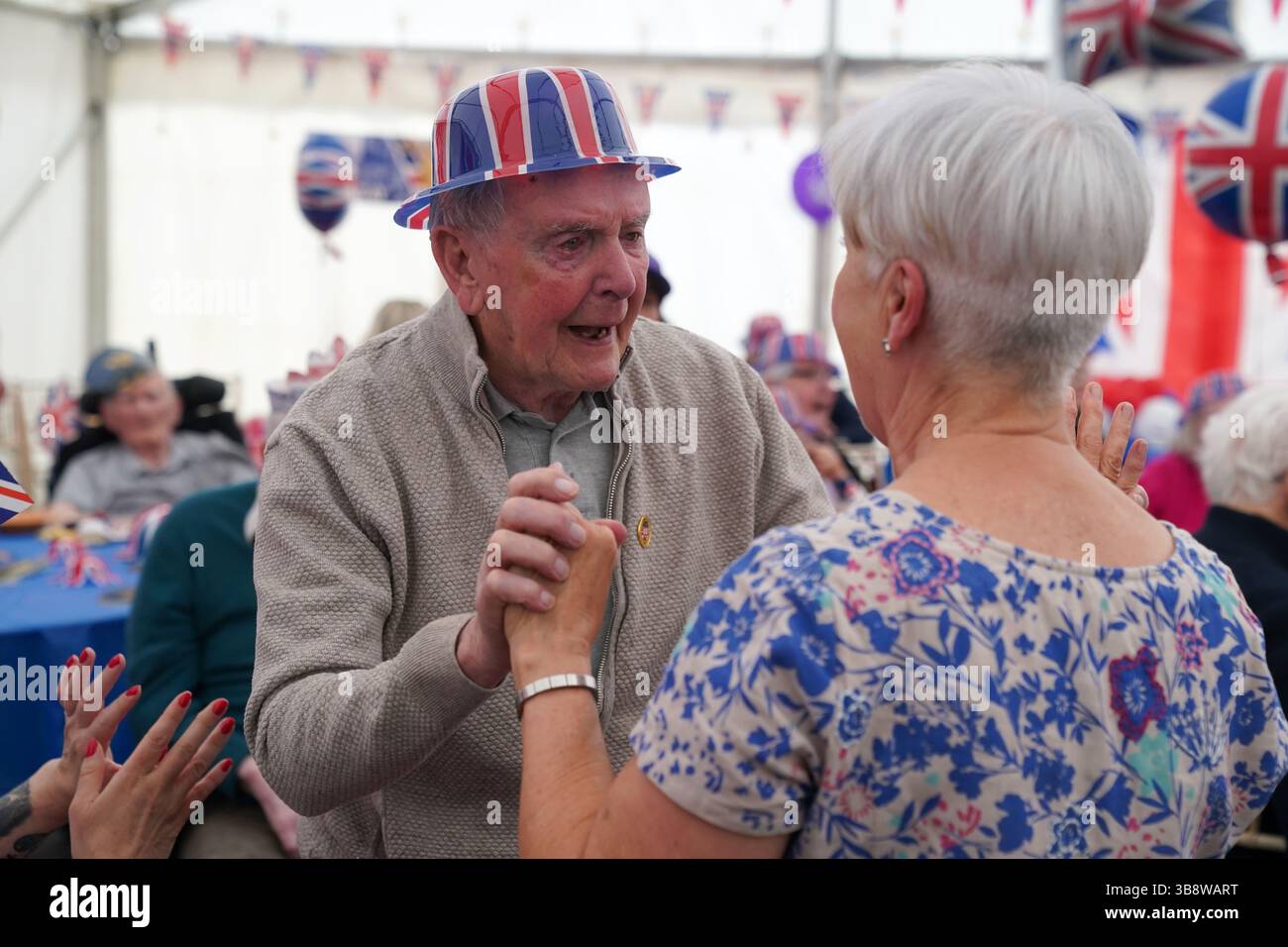 Veteran Robert Murray dances at a tea party at Erskine Veterans Home in ...