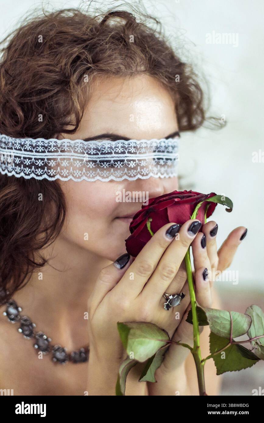 Close up portrait of a beautiful woman with clear white bandage on eyes ...