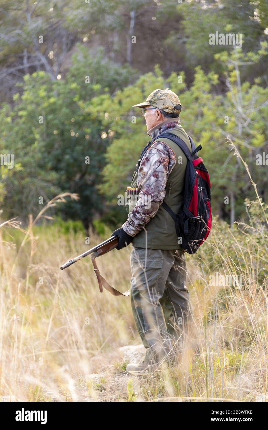 Military man walking through forest hi-res stock photography and images ...
