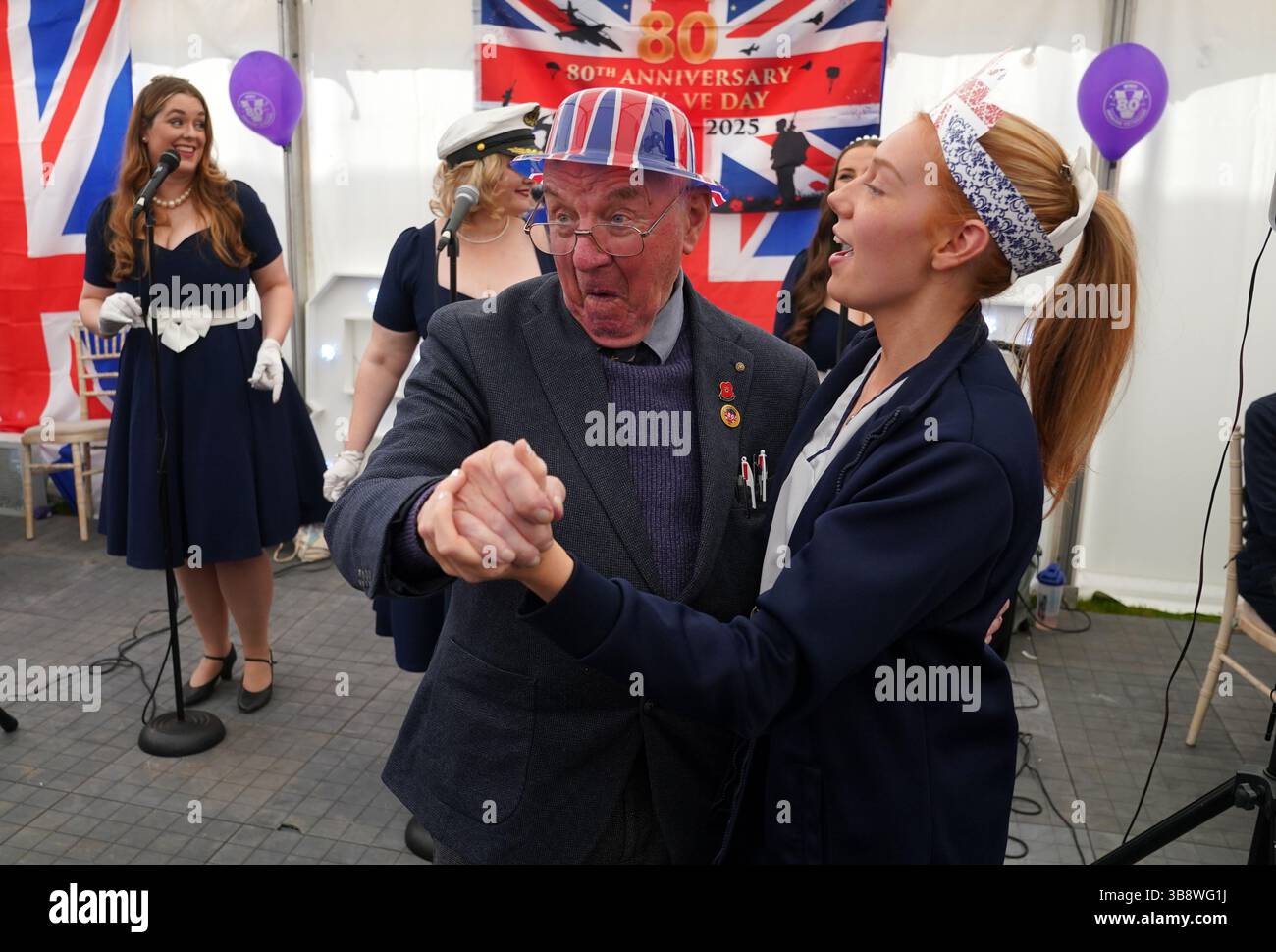 Staff dance with veteran Ian Drever at a tea party at Erskine Veterans ...