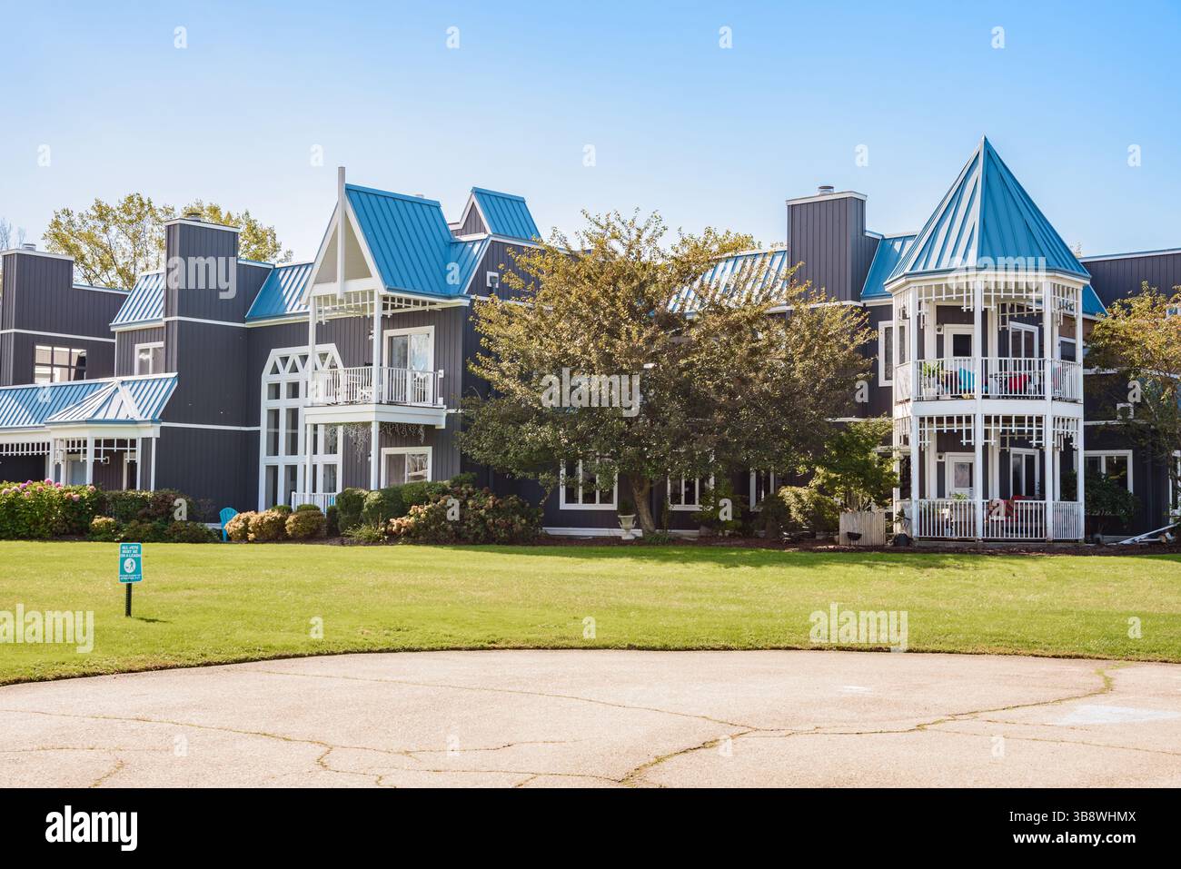 Exterior of a modern low rise apartment building on a clear autumn day ...