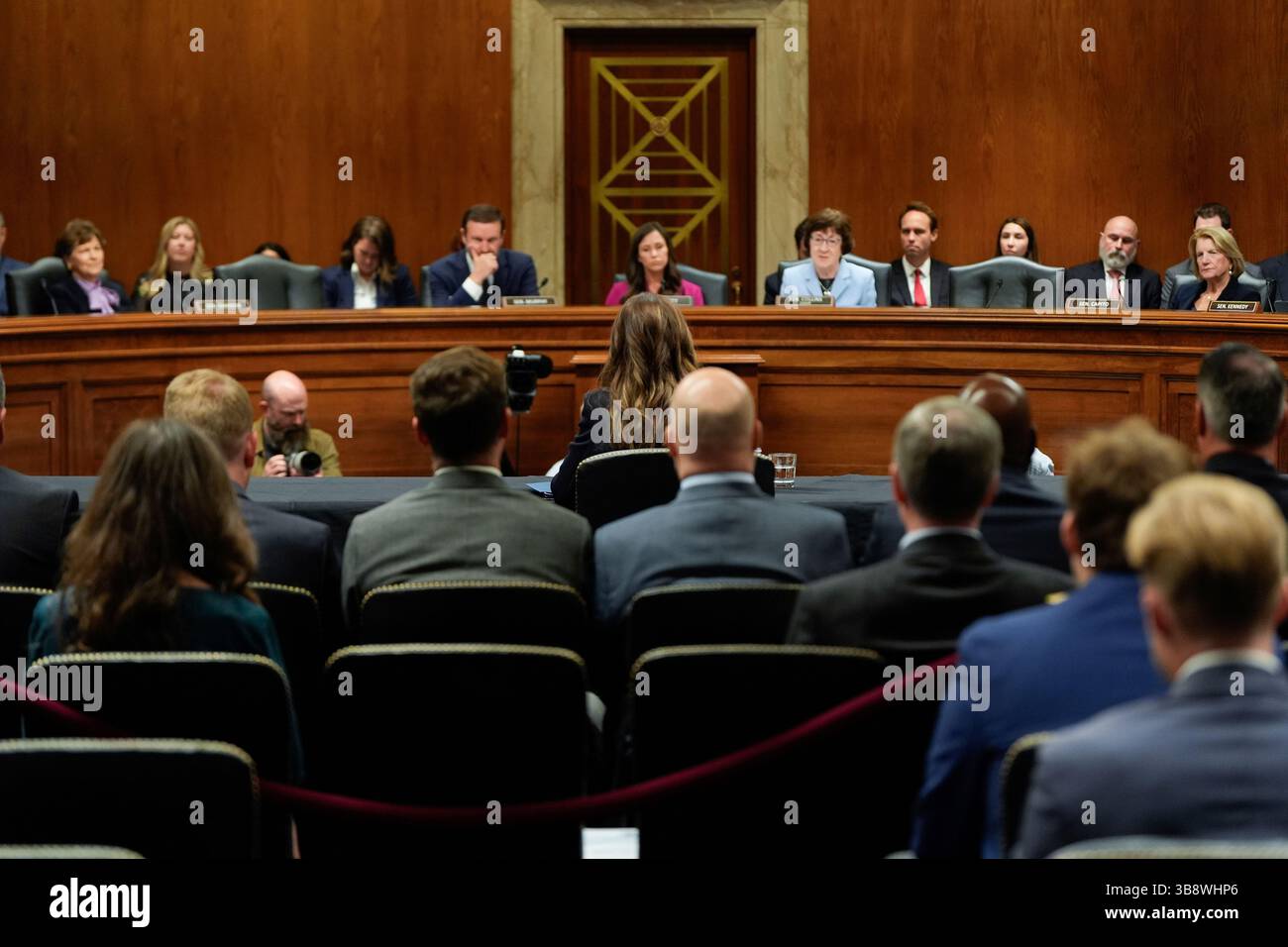 Homeland Security Secretary Kristi Noem, center, speaks during a Senate ...