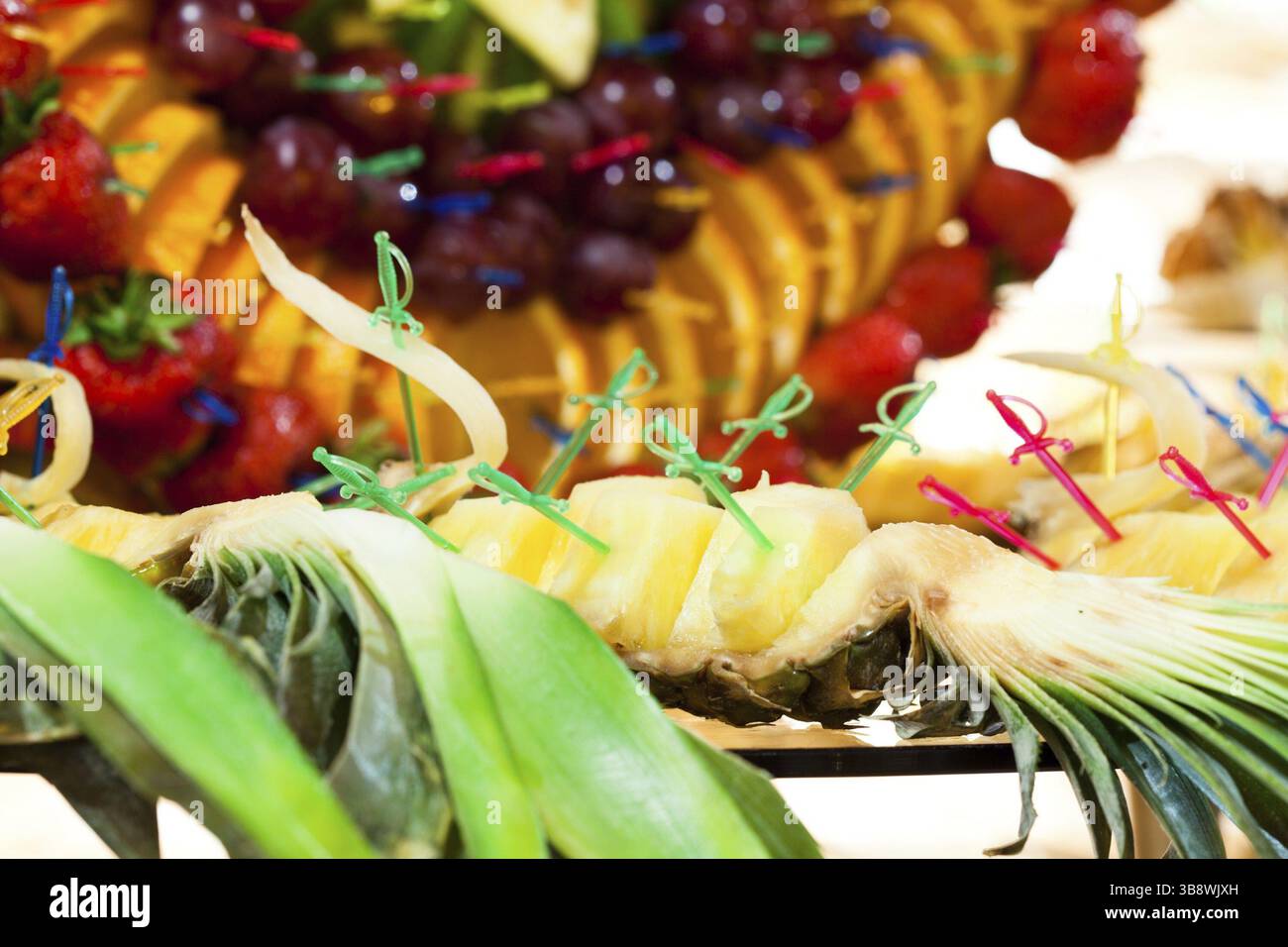 Pineapple swan, fruits lay design for event Stock Photo - Alamy