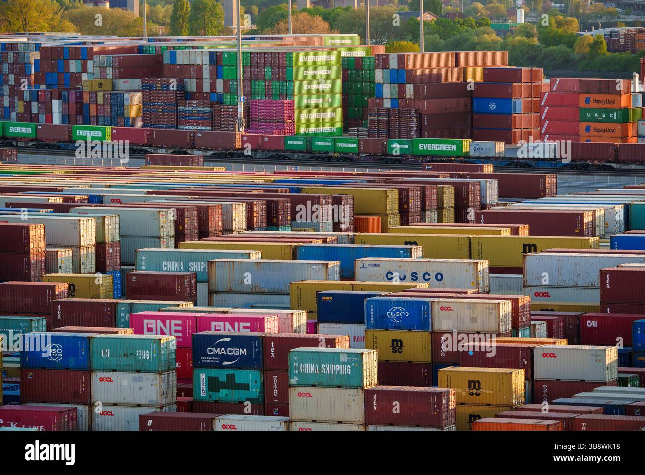 Hamburg, Germany - 27 April 2025: Stacked freight containers at a ...
