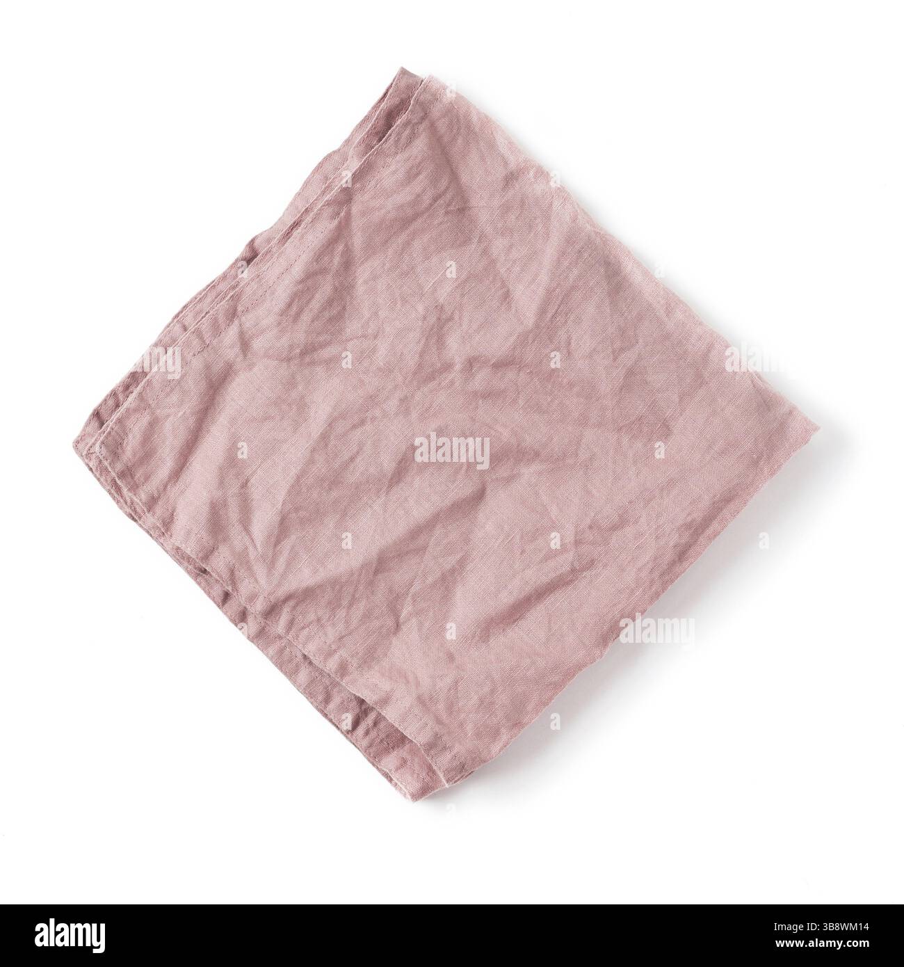 Folded old rose color linen napkin isolated on white background ...