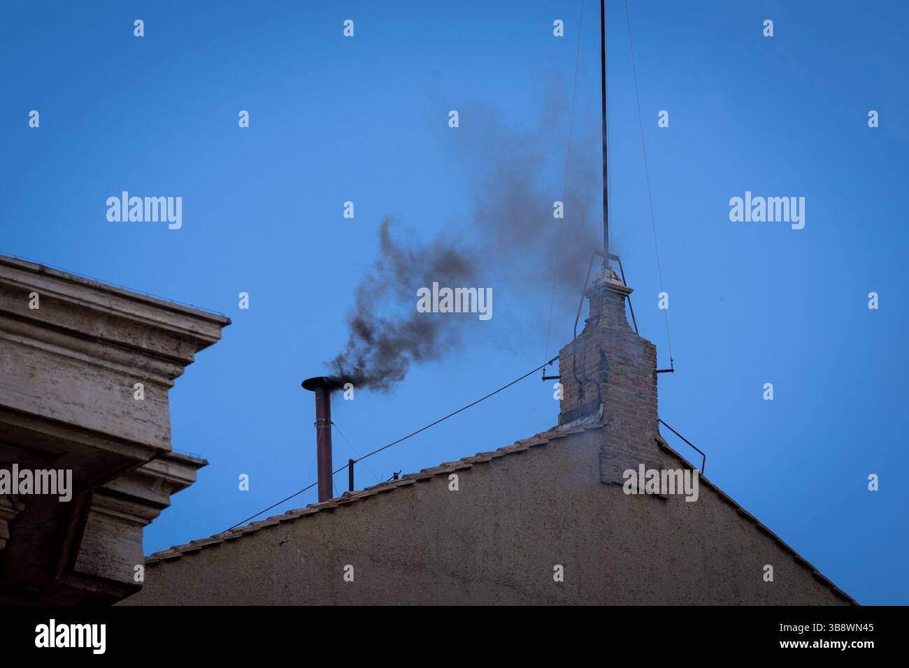 Vatican, Vatican. 08th May, 2025. Black smoke billows from the Sistine ...