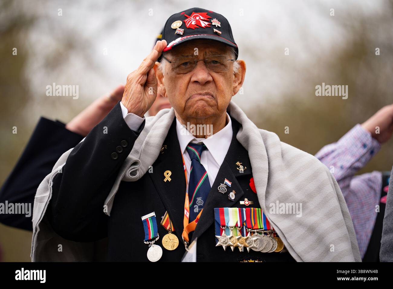 Second World War Veteran Percival James Smith salutes during a ceremony ...