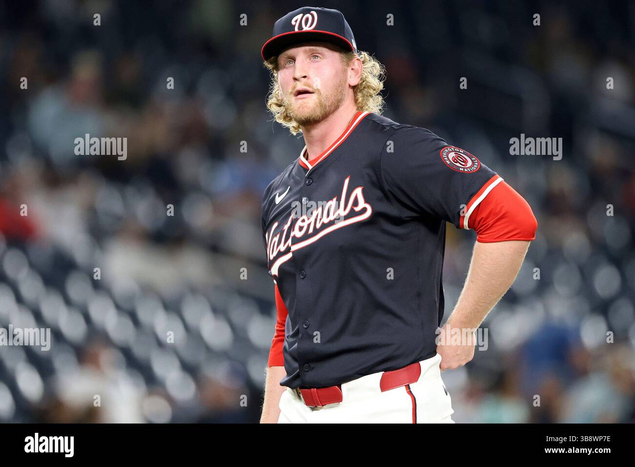 Washington Nationals pitcher Zach Brzykcy looks on during the ninth ...