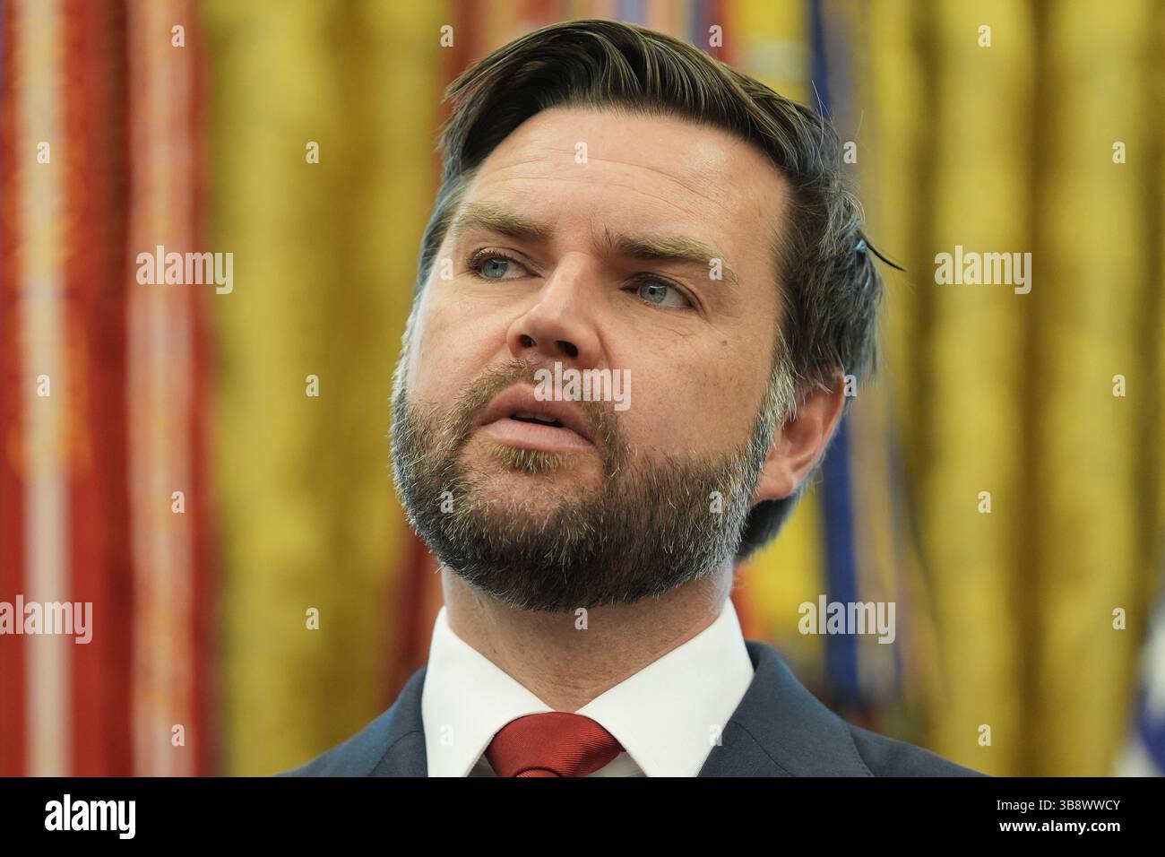Vice President JD Vance listens as President Donald Trump speaks with ...