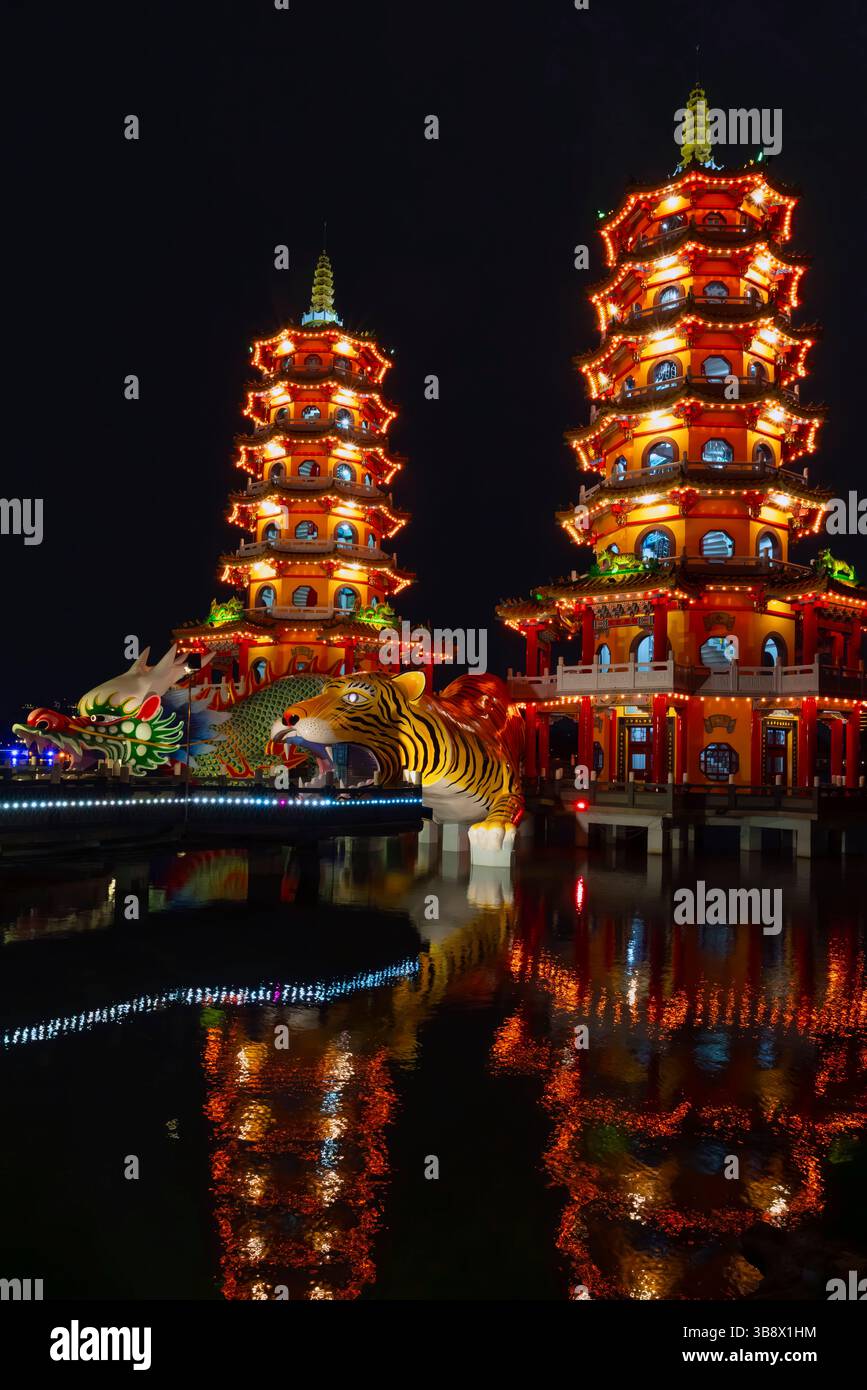 Night view of Dragon tower and Tiger tower. Dragon and Tiger Pagodas is ...