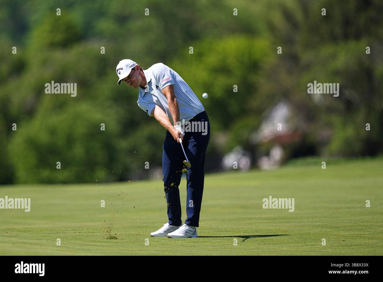 Rasmus Højgaard, of Denmark, hits on the tenth hole during the first ...