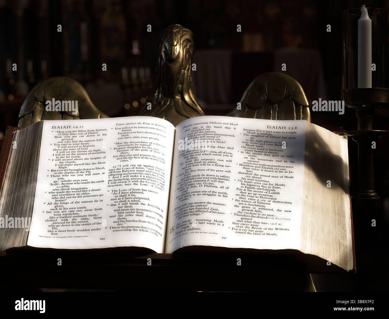 Open page, from the book of Isaiah in the Bible, on a lectern in the ...