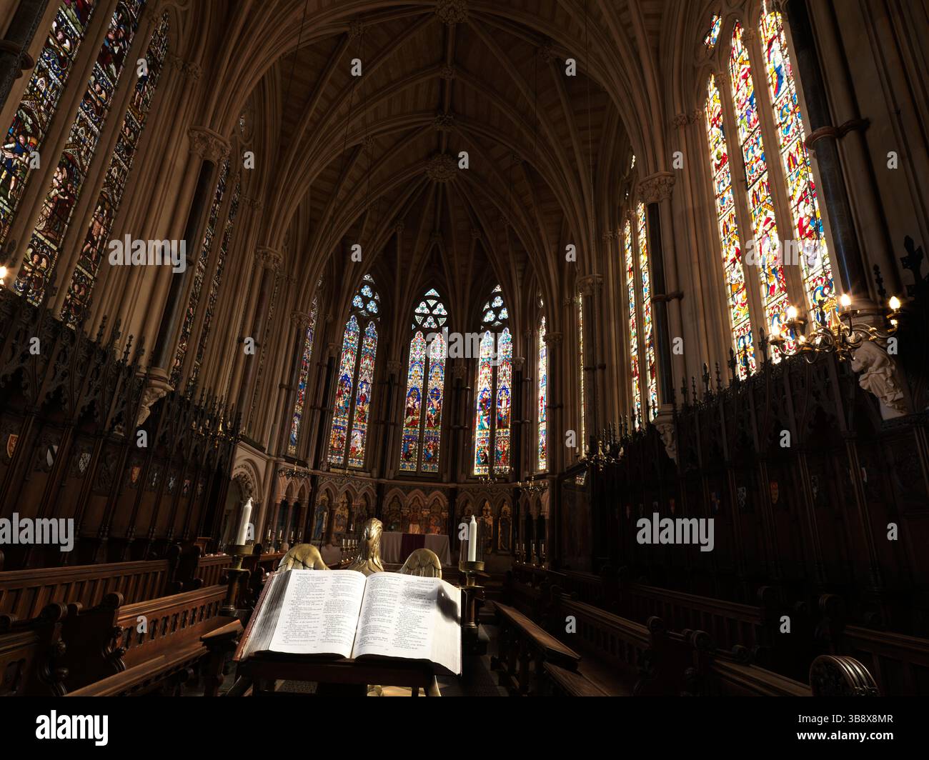 Open page, from the book of Isaiah in the Bible, on a lectern in the ...