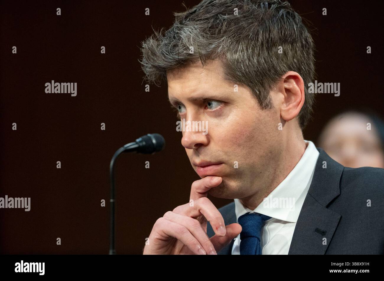 Sam Altman, co-founder and chief executive officer, OpenAI, listens to ...