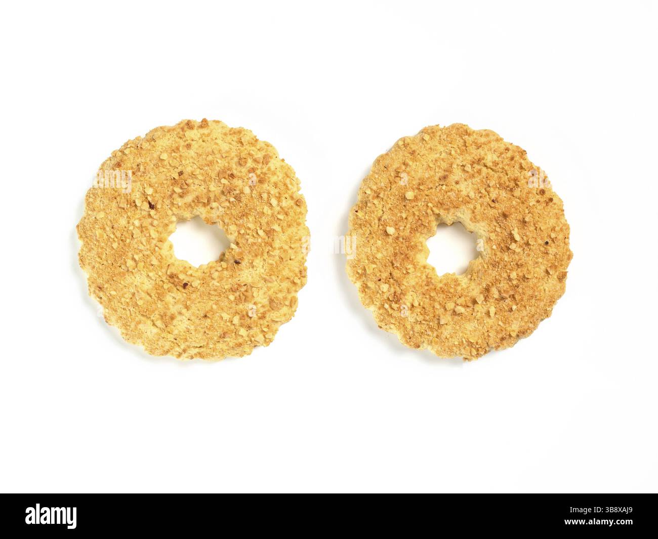 Two shortbread ring cookies with nuts.Sand ring with nuts isolated ...