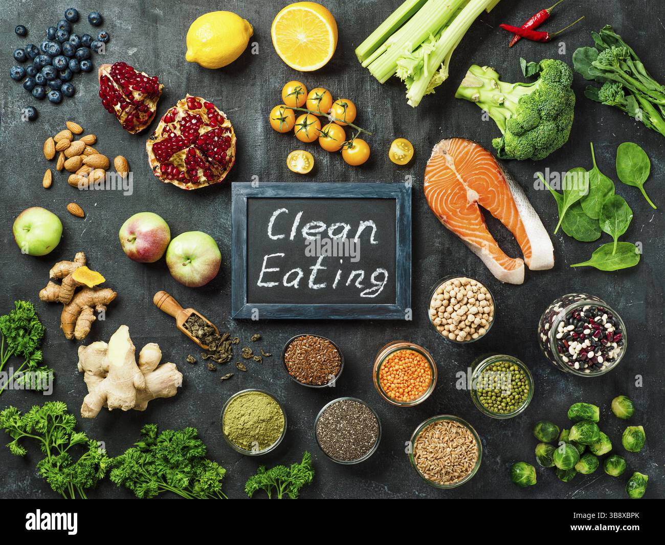 Clean Eating concept. Selection food ingredients and chalkboard with ...