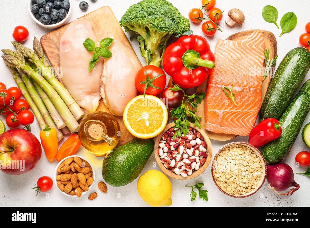 Food background. Fresh vegetables, meat, fish, grains, leaves and ...