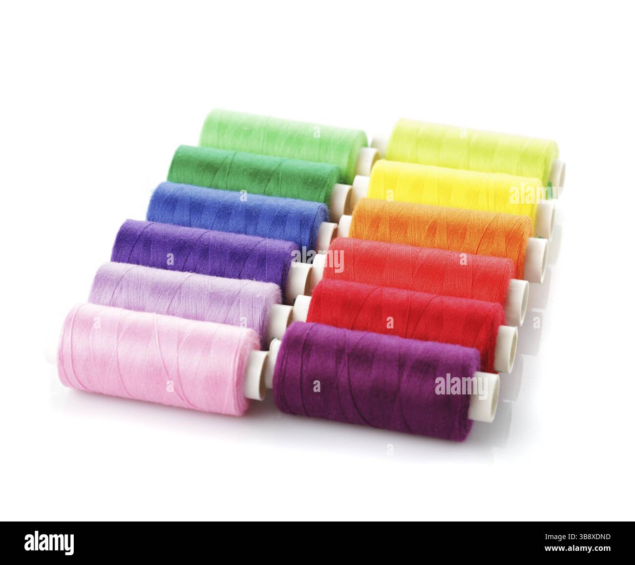 Many colored spools threads Cut Out Stock Images & Pictures - Alamy