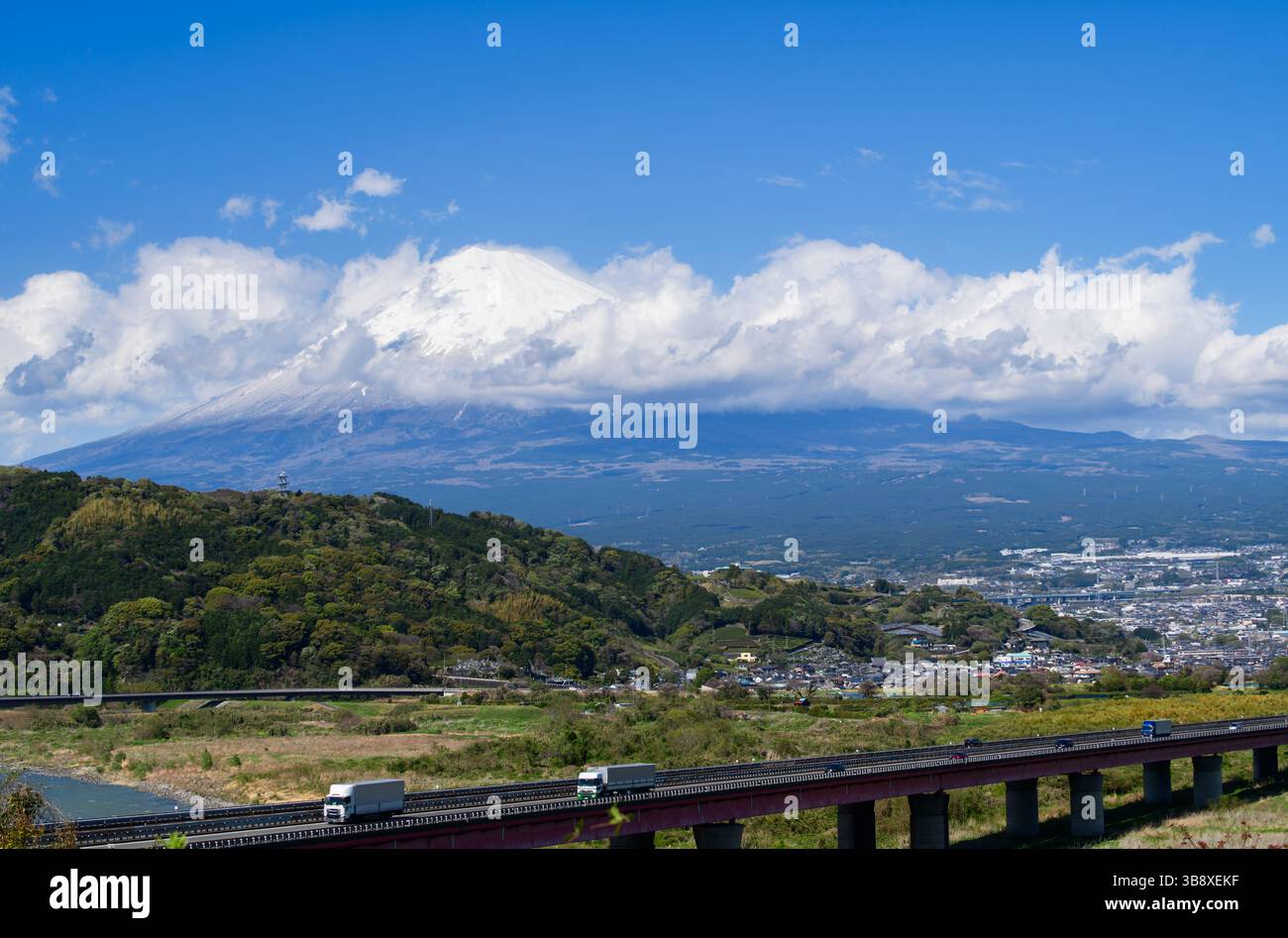 This panoramic landscape captures the peaceful coexistence of urban ...