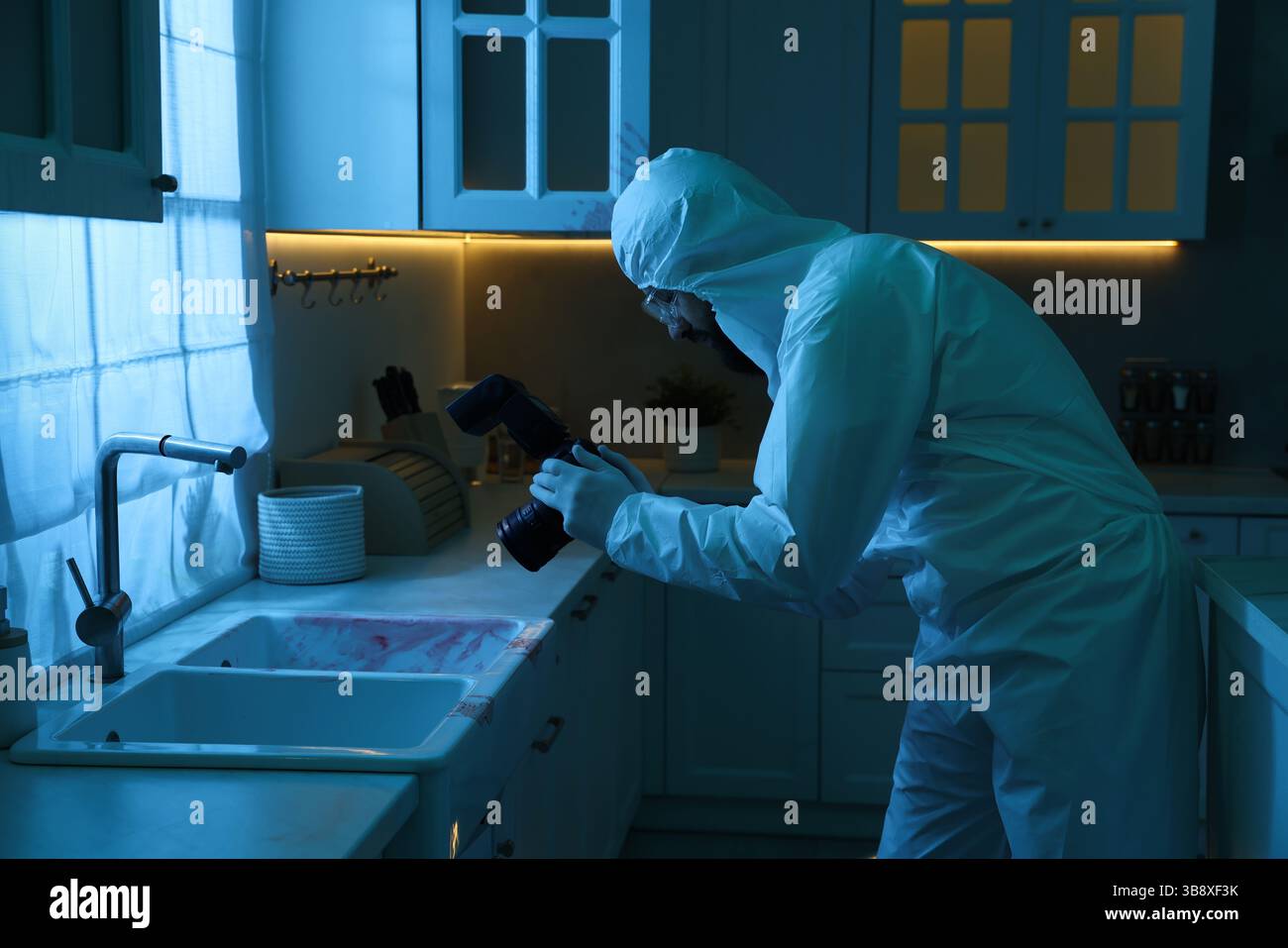 Forensic expert with camera working at crime scene indoors Stock Photo ...