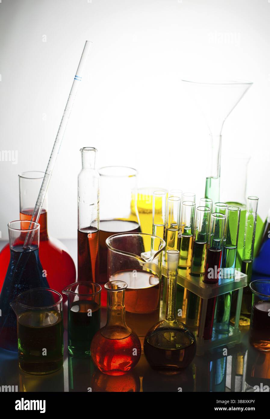 Laboratory glass with rainbow color liquids, chemistry still life Stock ...