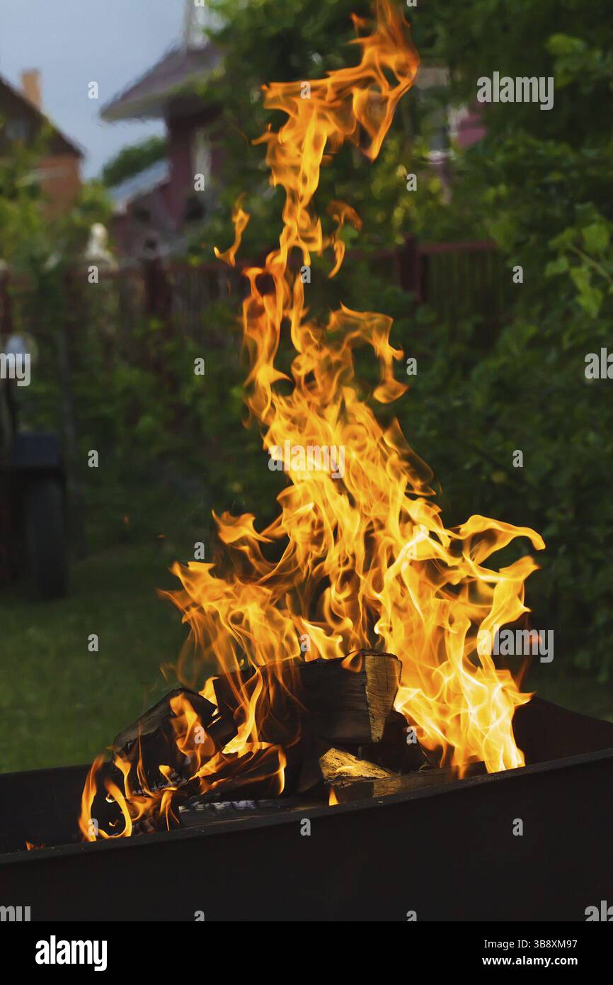 Firewood burning in courtyard hi-res stock photography and images - Alamy