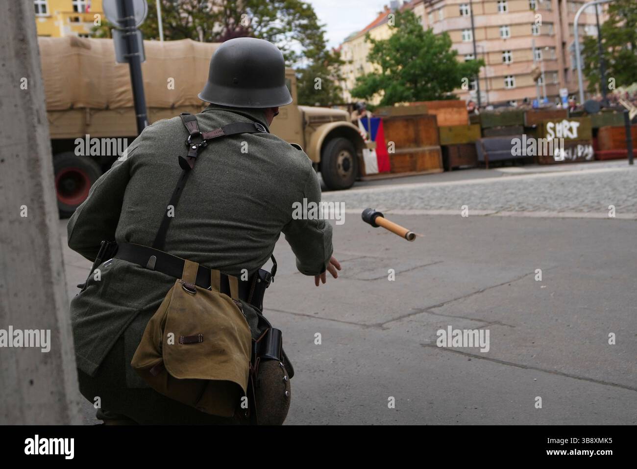 History enthusiasts take part in a reenactment of a battle, which was ...