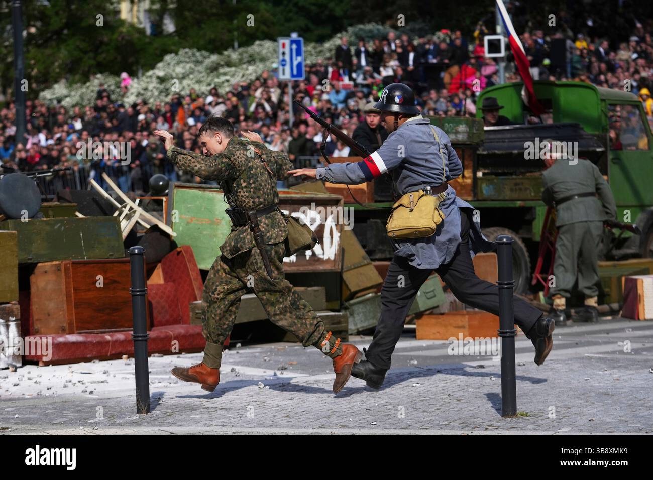 History enthusiasts take part in a reenactment of a battle, which was ...