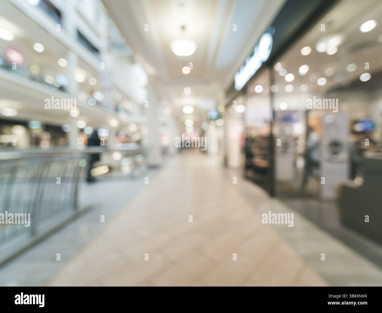 Shopping mall blur background with bokeh. Blurred hall of shopping mall ...