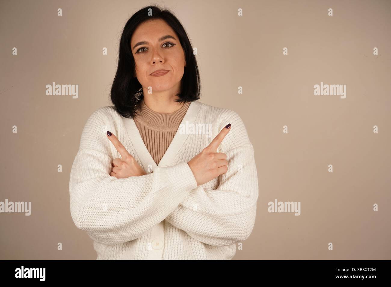 The gesture conveys creativity, focus, and a spark of inspiration. A ...