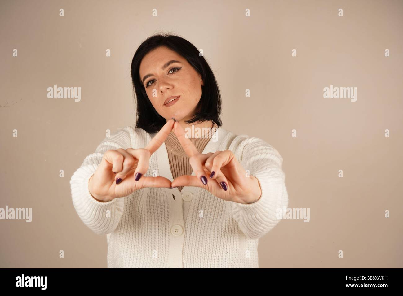 This gesture is a universal symbol for peace and understanding, often ...