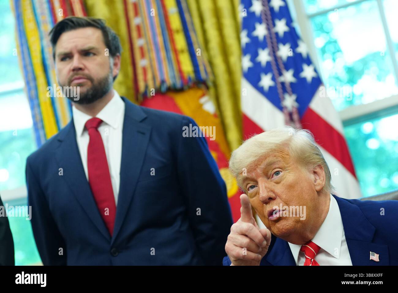 Vice President JD Vance looks on as US President Donald Trump announces ...