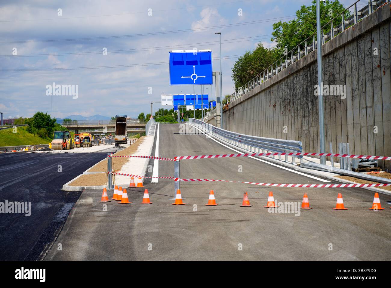 Highway Ramp Closed for New Asphalt Layer Installation Stock Photo - Alamy