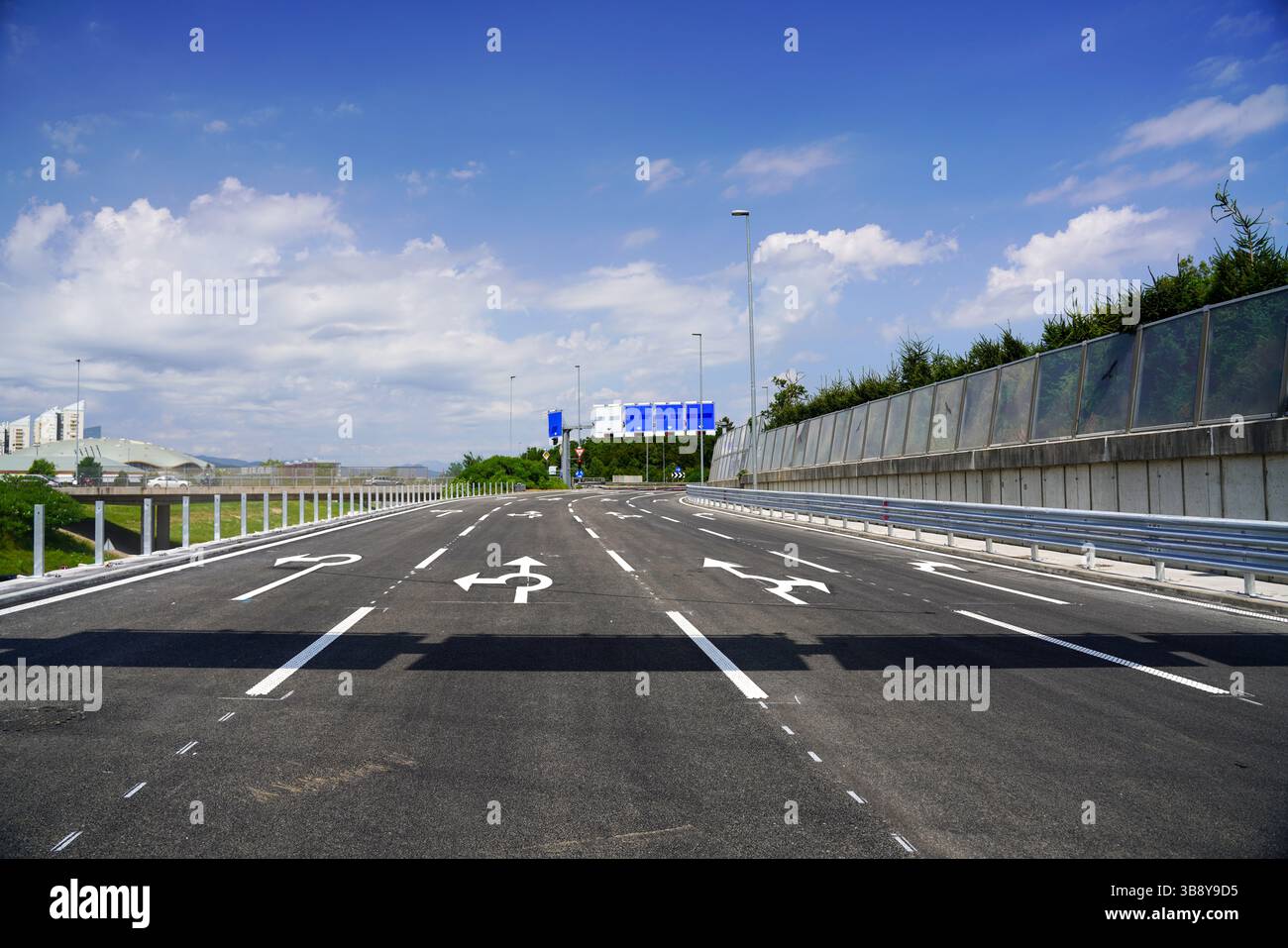 New Highway Ramp Leading to Roundabout with Fresh Road Markings Stock ...