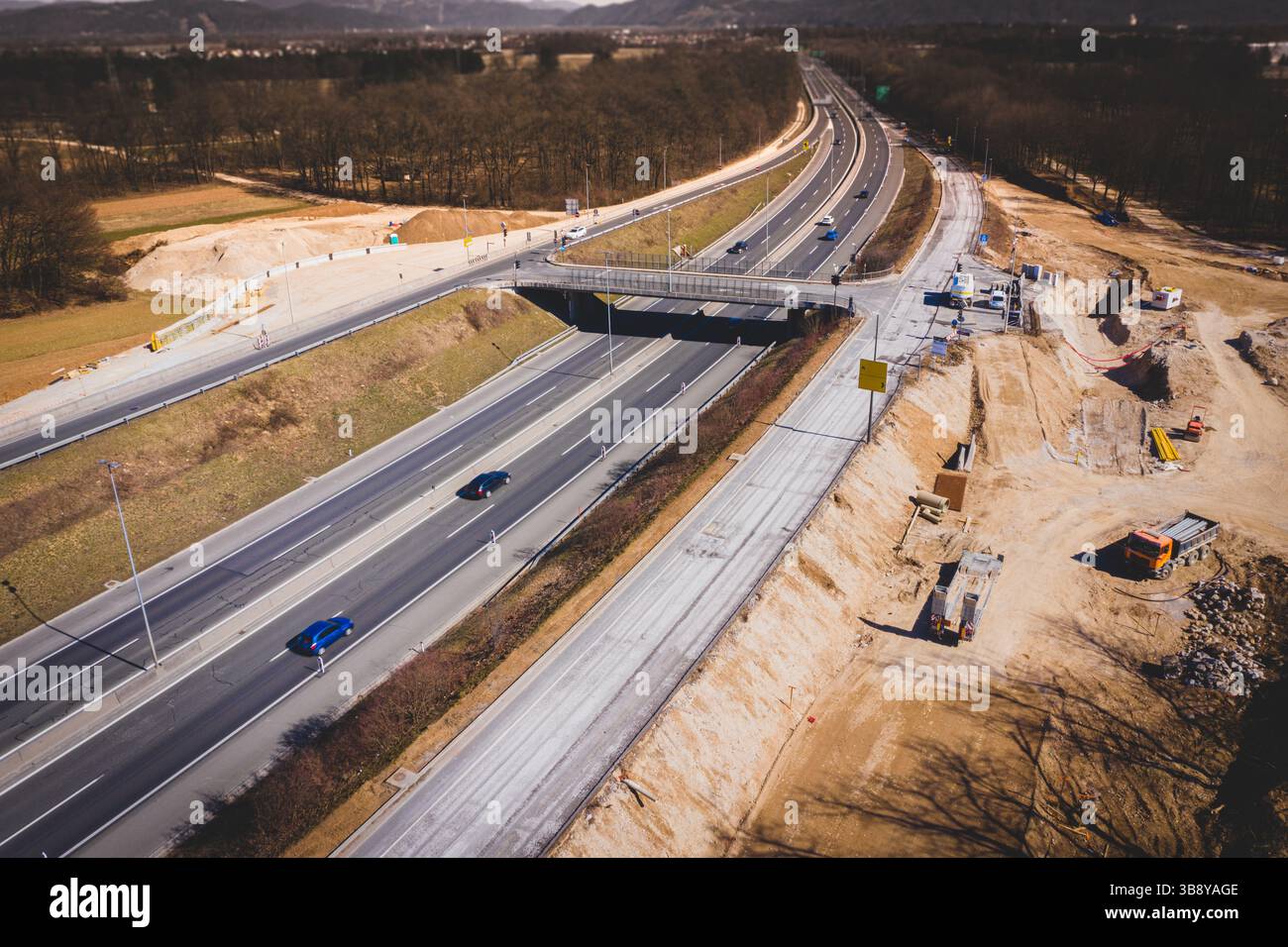 Aerial View of Early Construction Phase of Highway Overpass, Roundabout ...
