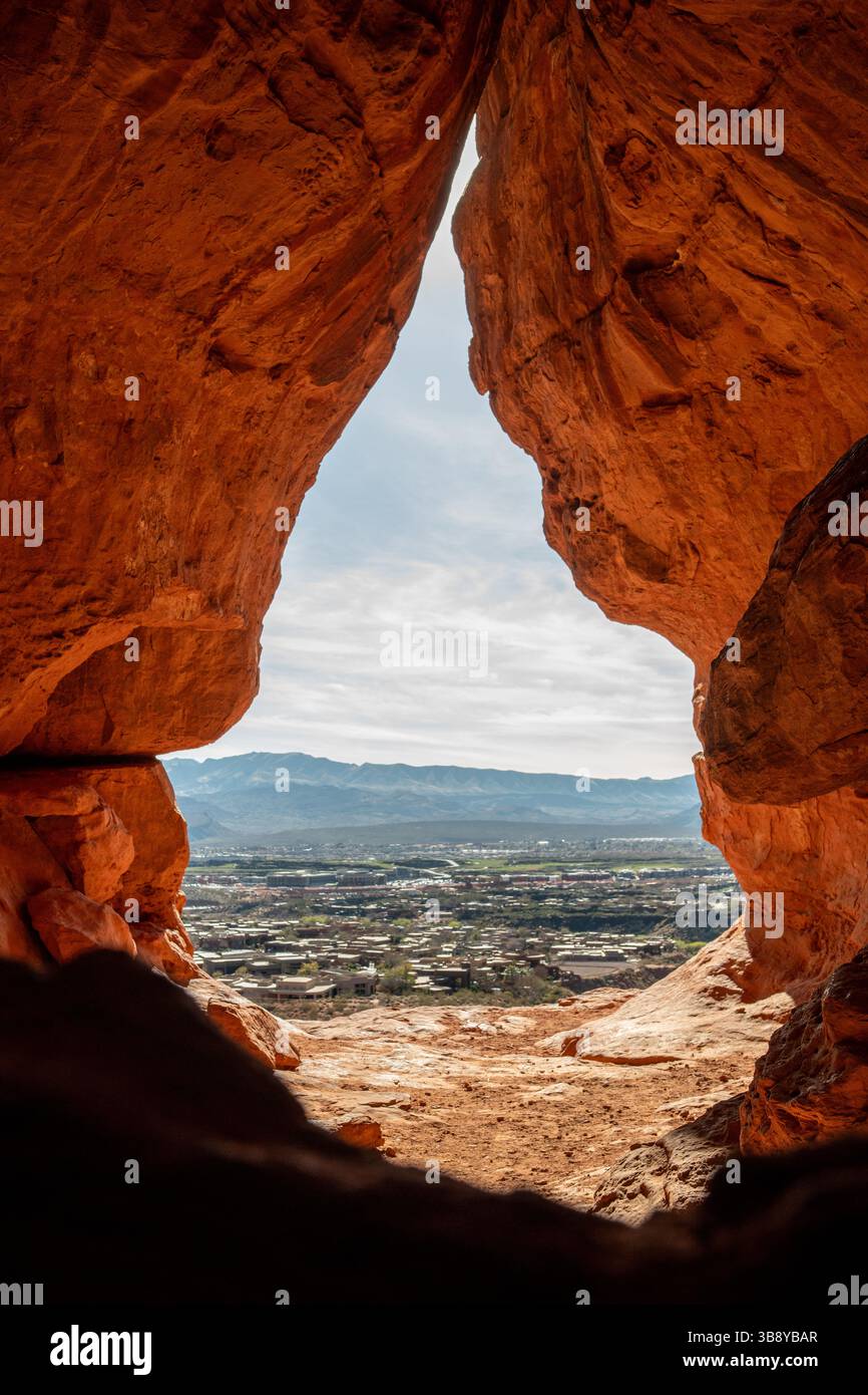 A beautiful view looking out from Scout Cave over St. George, Utah. A ...