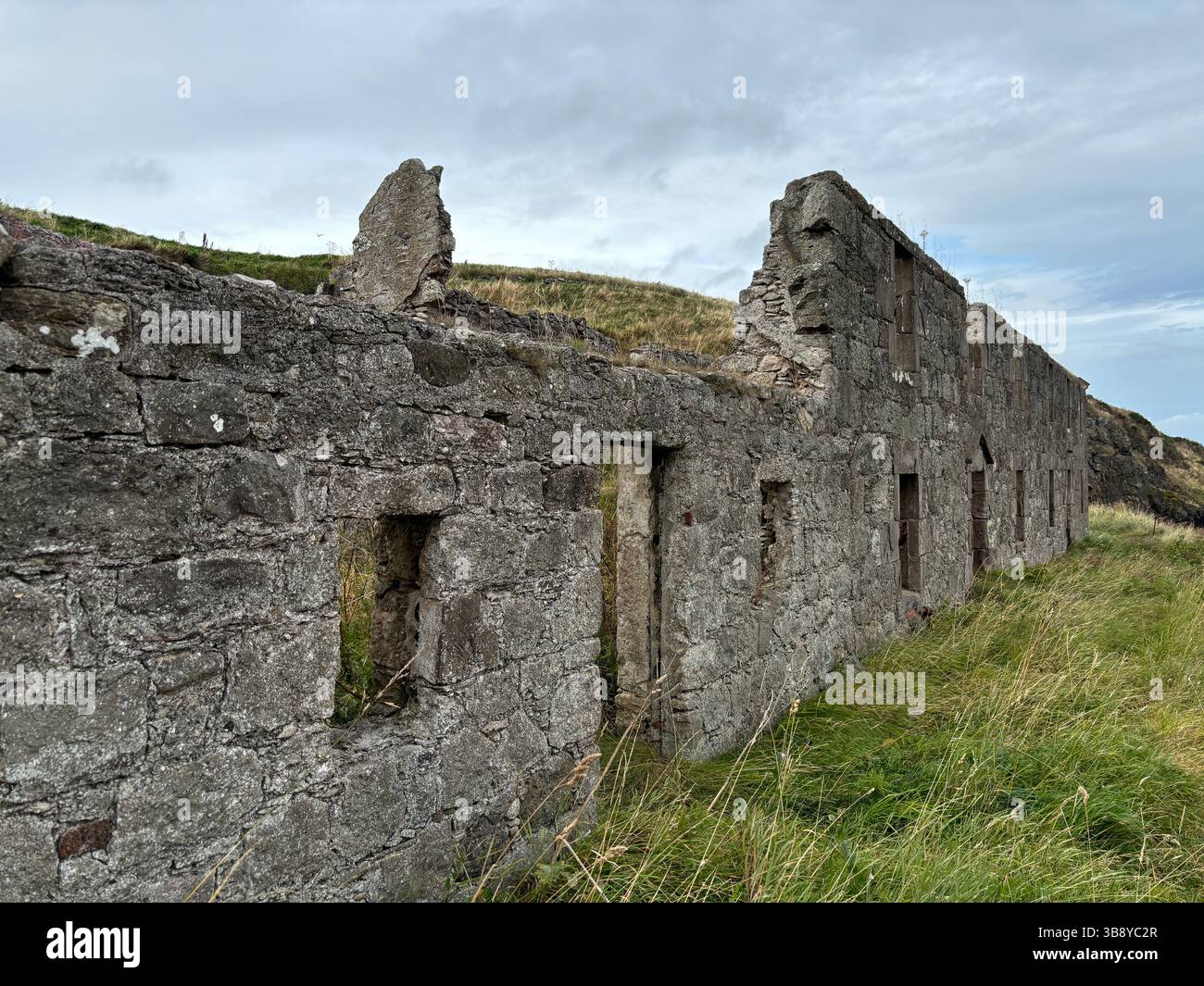 Abandoned Scottish fishing houses buildings stone on the coast. Ruined ...