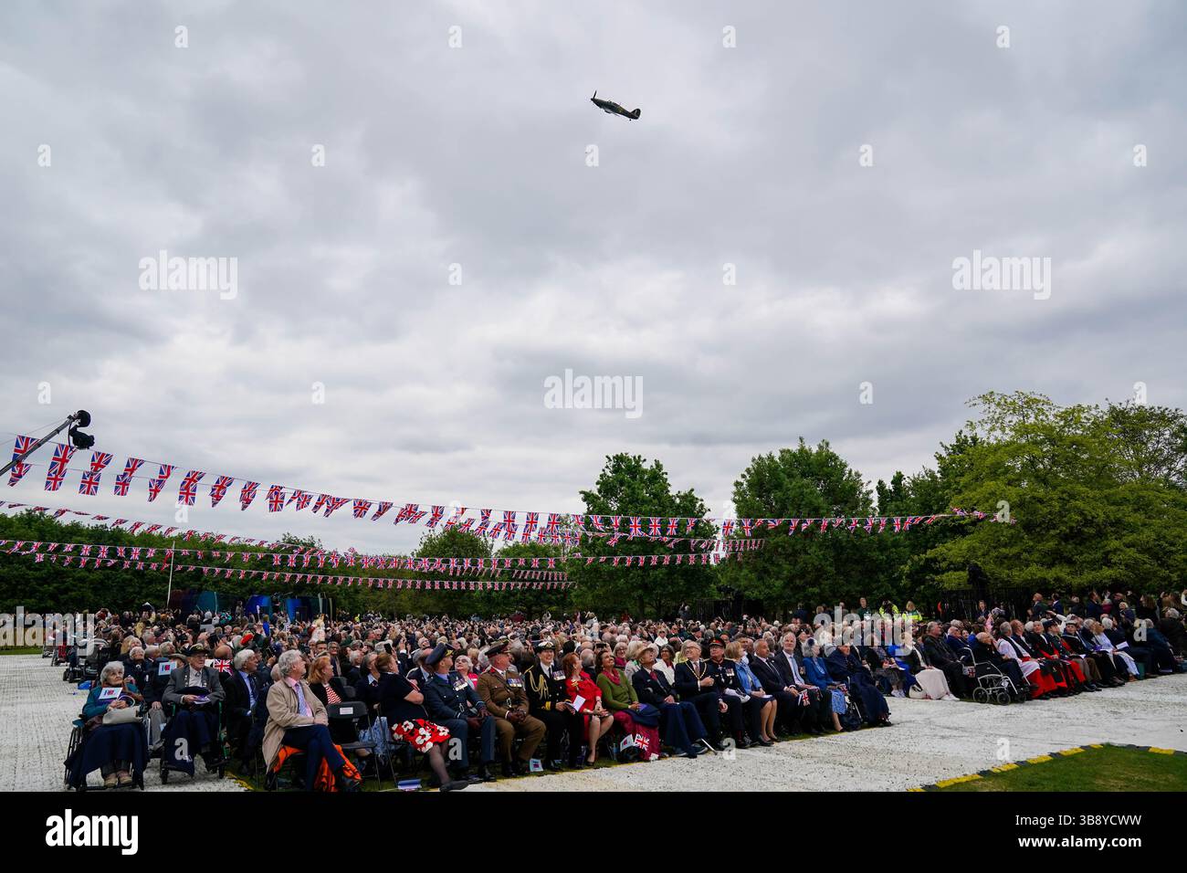 An RAF fly-past flies over the service during a service of remembrance ...