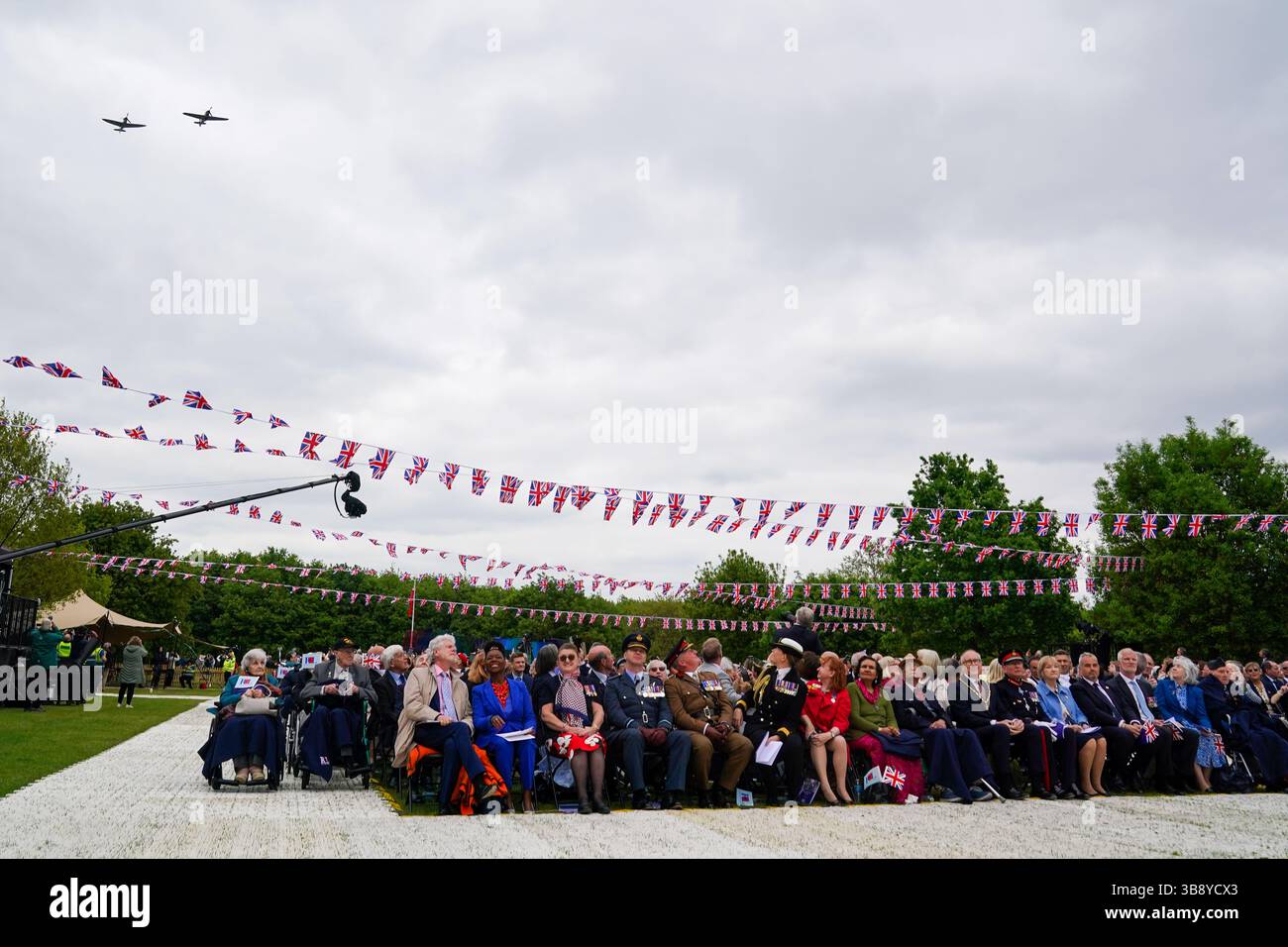 An RAF fly-past flies over the service during a service of remembrance ...