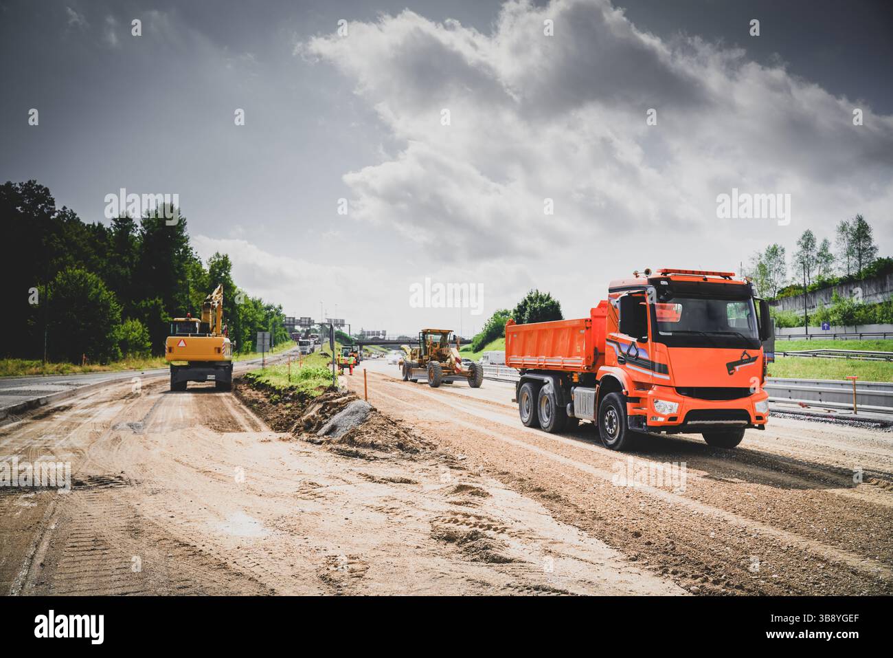 Cinematic View of Highway Construction Site with Dump Truck, Excavator ...