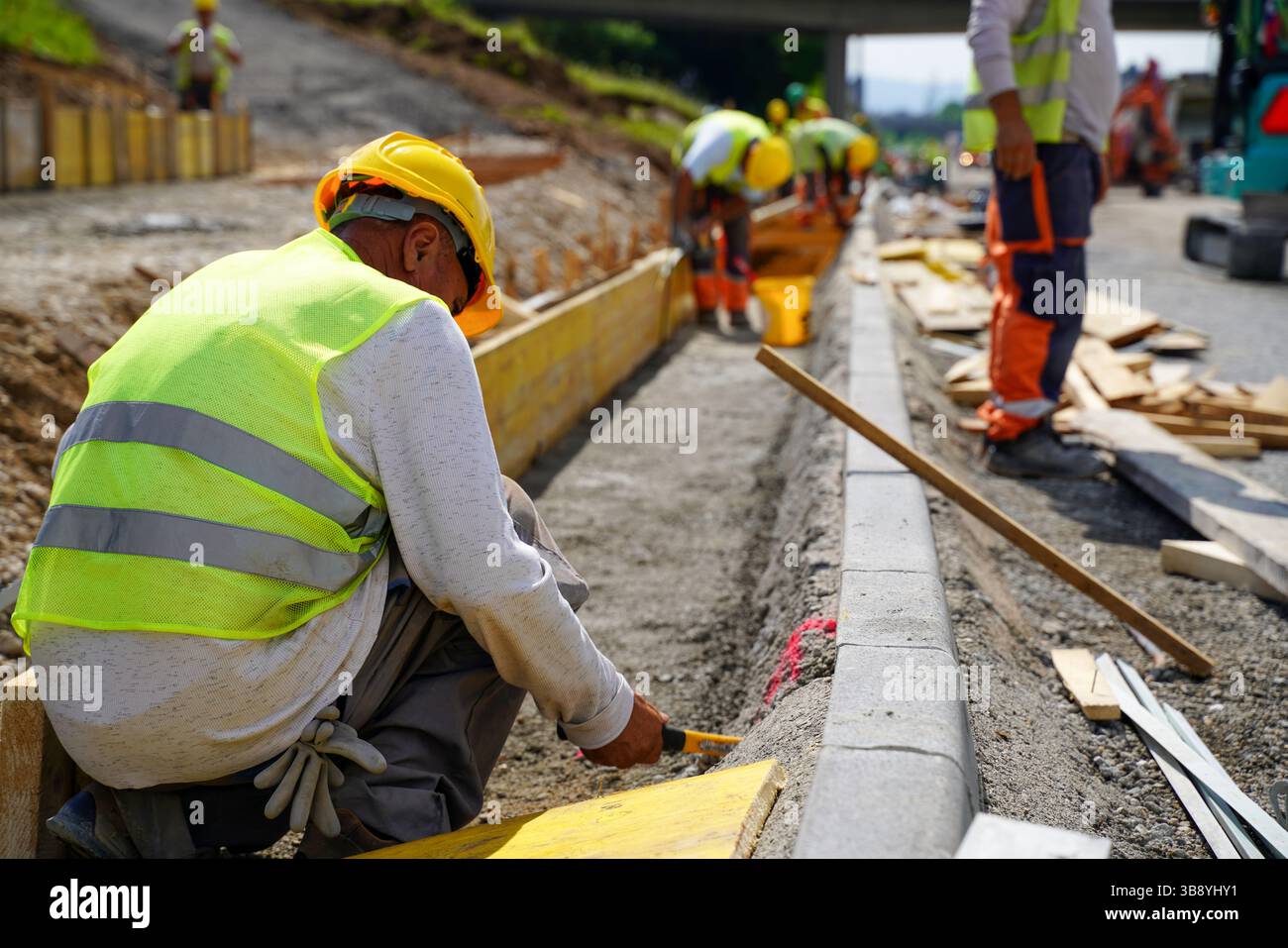 Construction of Road Curbs for Highway Shoulder at Highway Construction ...
