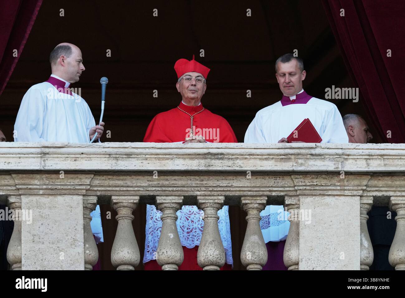 Cardinal Protodeacon Dominique Mamberti announces from the central ...