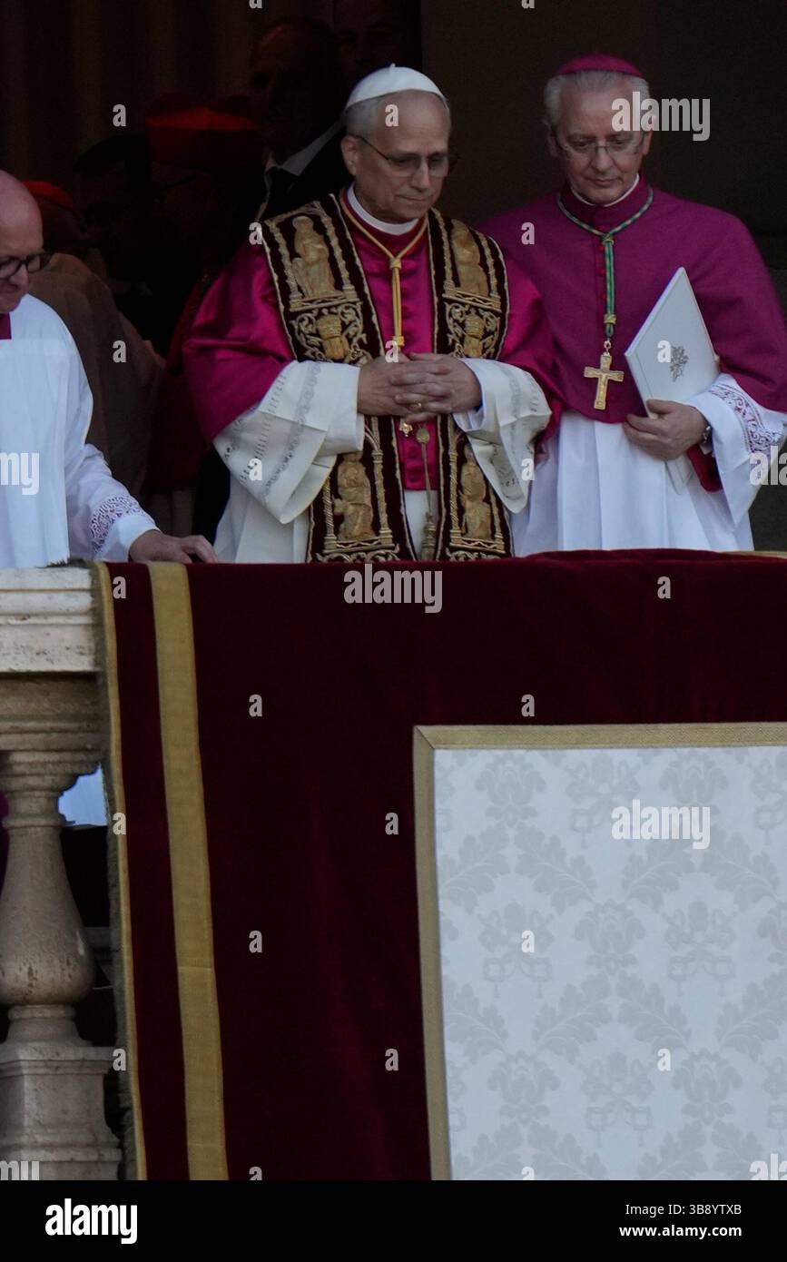 Pope Leo XIV appears on the balcony of St Peter's Basilica after his ...