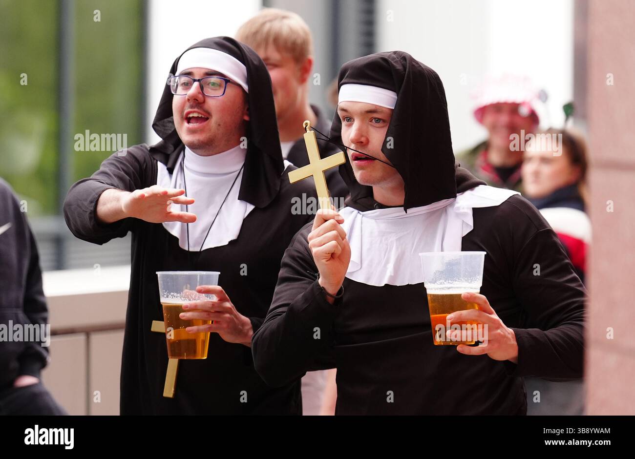 People in fancy dress as nuns arriving for night fourteen of the BetMGM ...