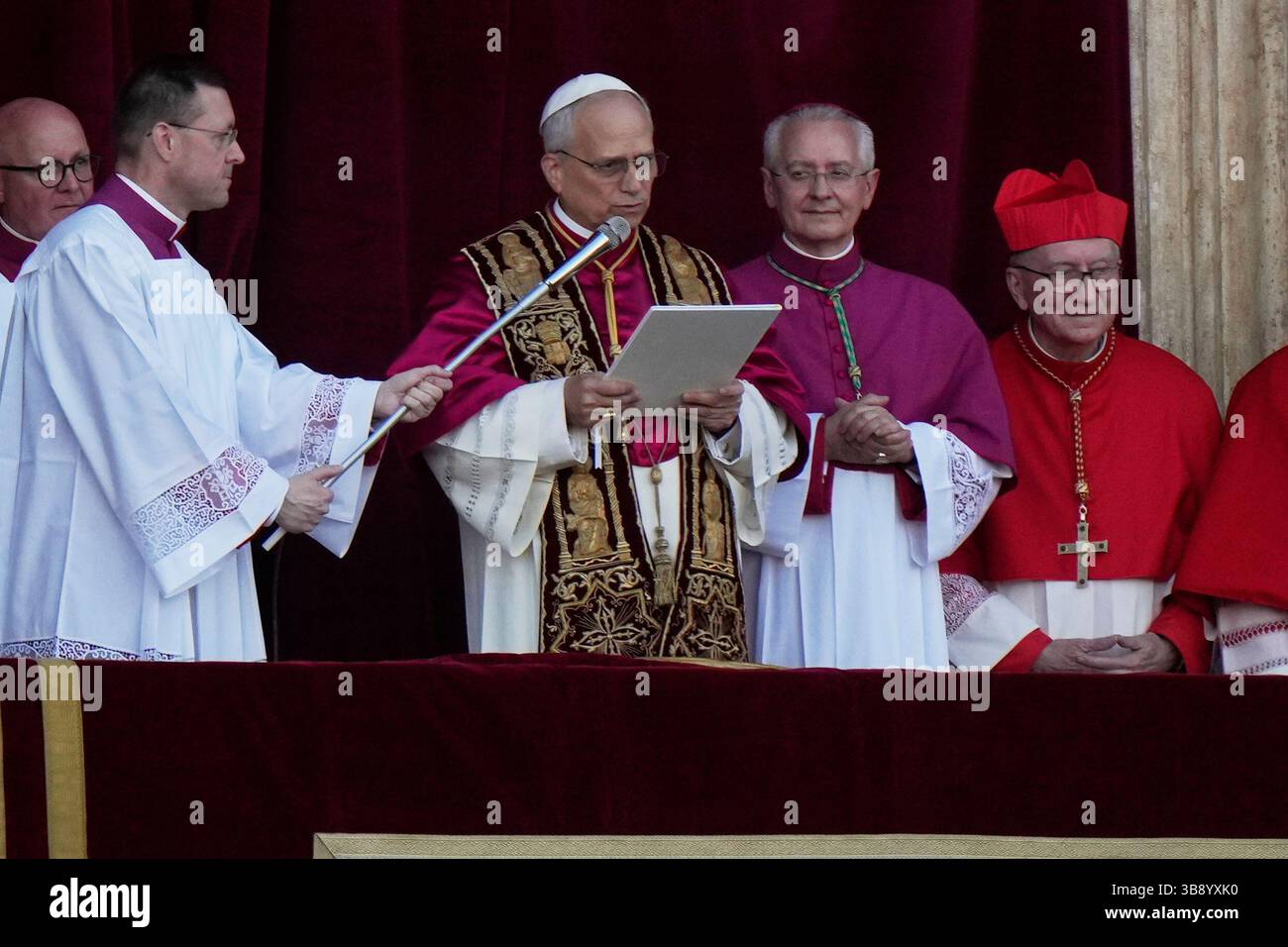 Pope Leo XIV appears on the balcony of St Peter's Basilica after his ...